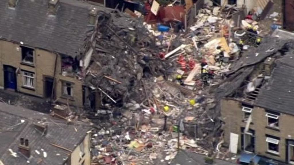 Child killed as 'gas' explosion rips through houses - BBC News